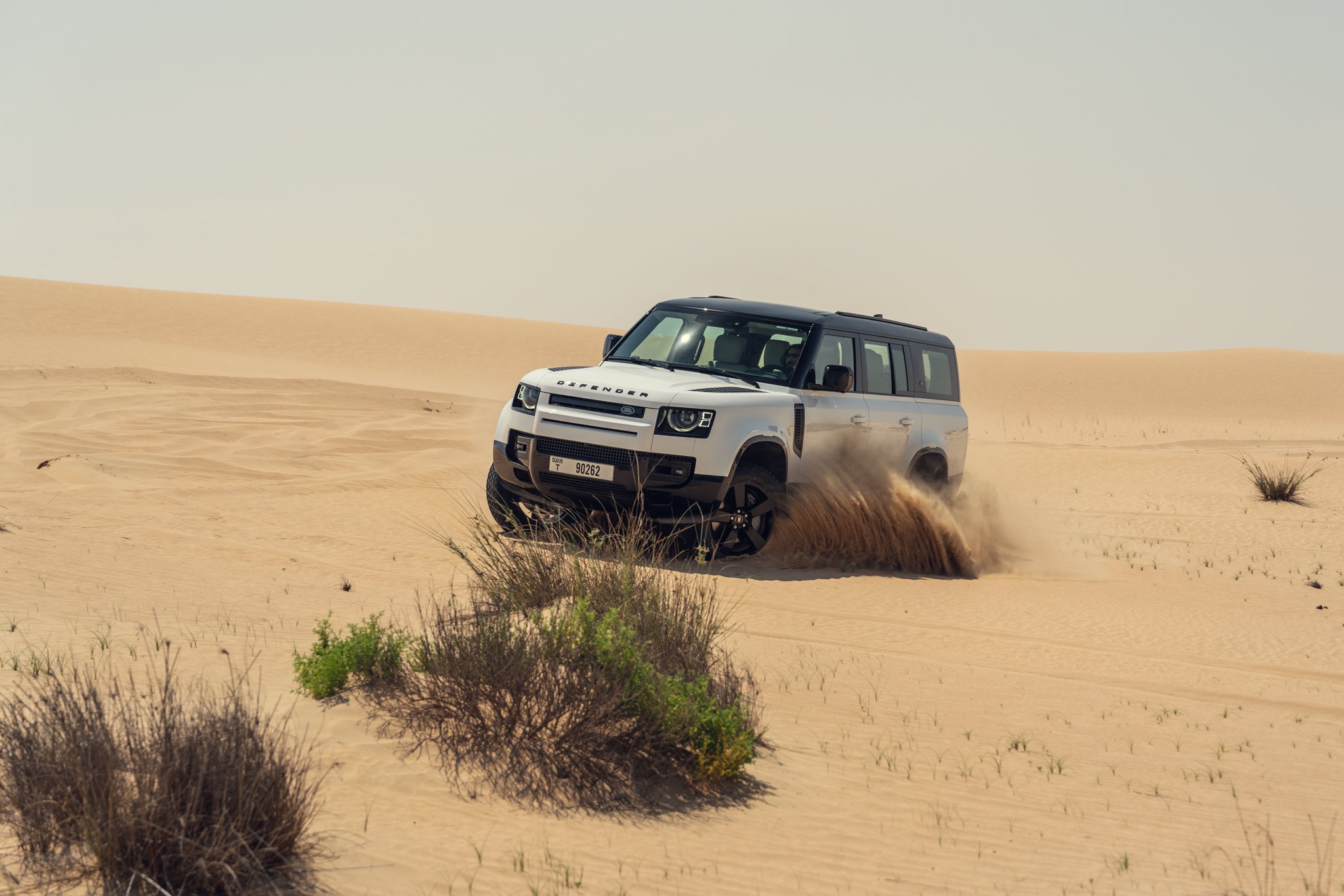 Taming the desert in the Land Rover Defender 130 | AutoDrift.ae